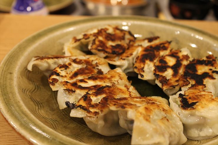 Japanese cooking lesson in Ningyocho: Gyoza, eggplant, and corn rice ...